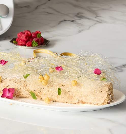 Hazelnut meringue roulade with spun sugar - Cookidoo® – the official ...